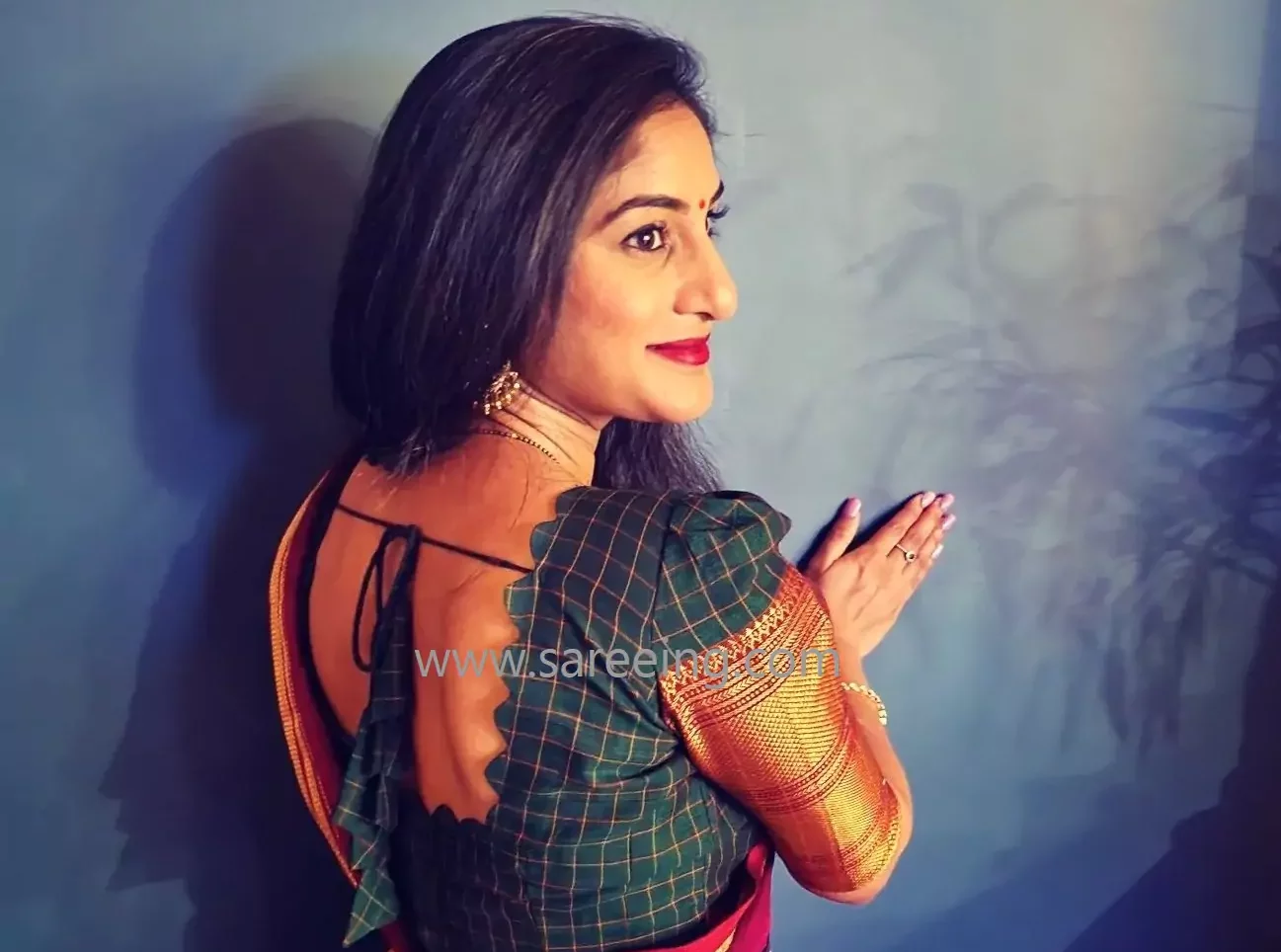 Beauty of Scalloped Border Blouse: Harini's Traditional Half Saree..