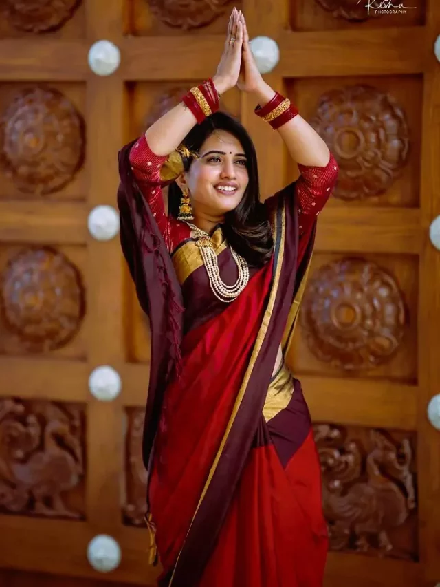 A Spiritual Sojourn: Sravanthi's Temple Visit in Maroon Elegance