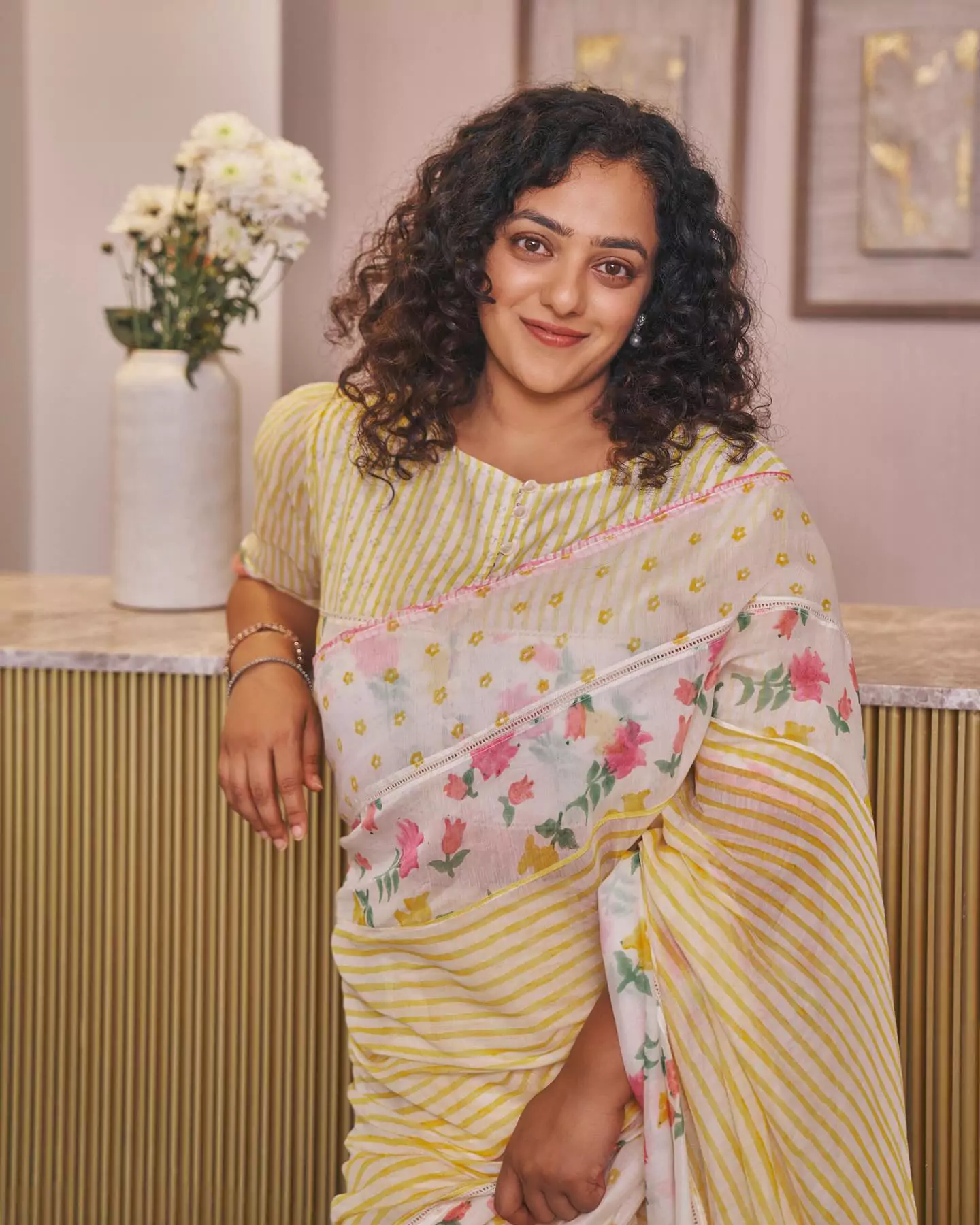 Elegant Yellow Floral Saree Look by Nithya Menon............